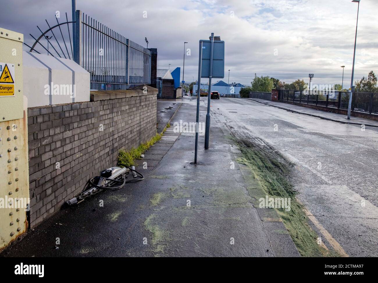 Car parts are pushed to the side of Frederick Road in Salford, Greater ...
