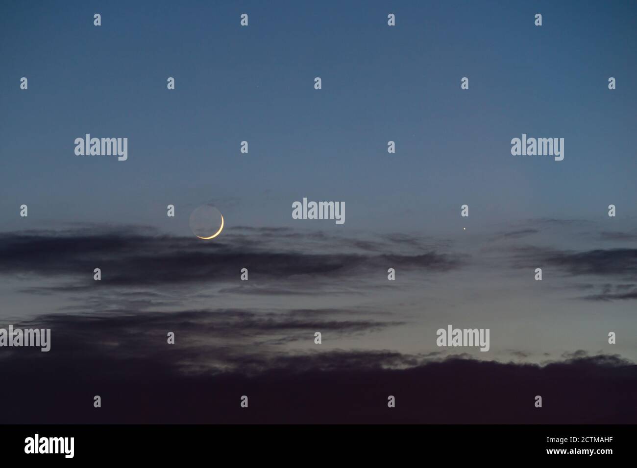 Crescent Moon, Earthshine and Planet Mercury Stock Photo - Alamy