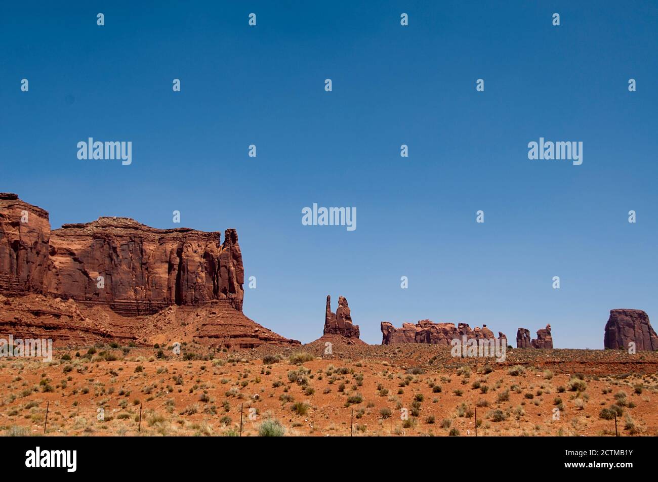 Some of the famous sandstone buttes located in Monument Valley, a ...