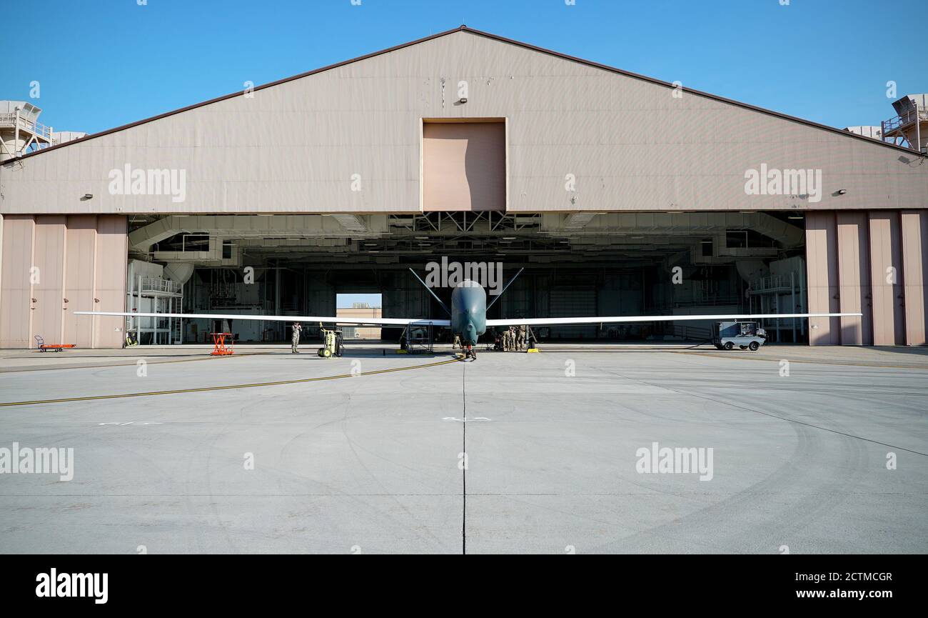 An RQ-4 Global Hawk awaits preflight maintenance on Grand Forks Air ...