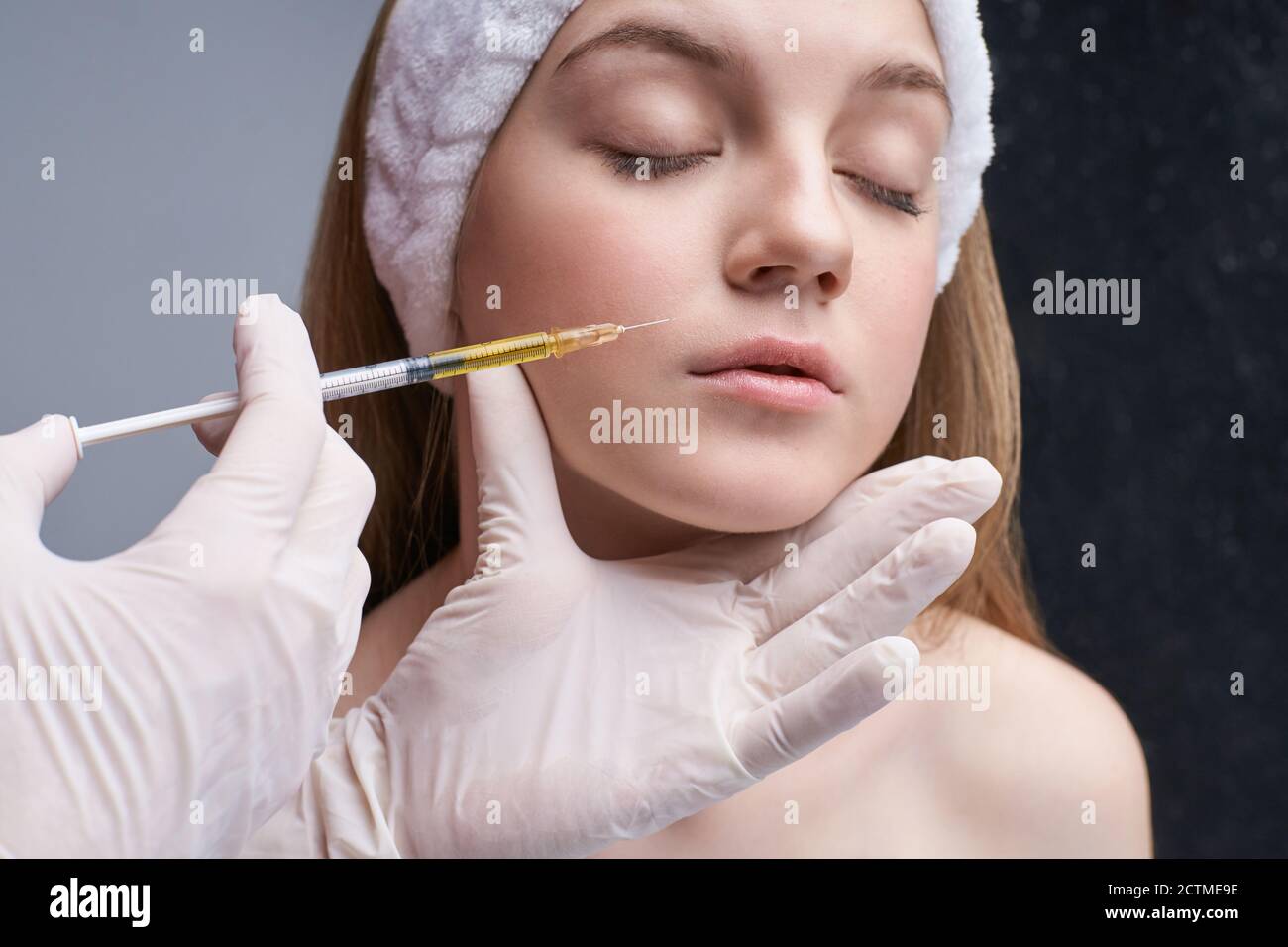Young pretty woman studio portrait. Cosmetology injection concept Stock ...