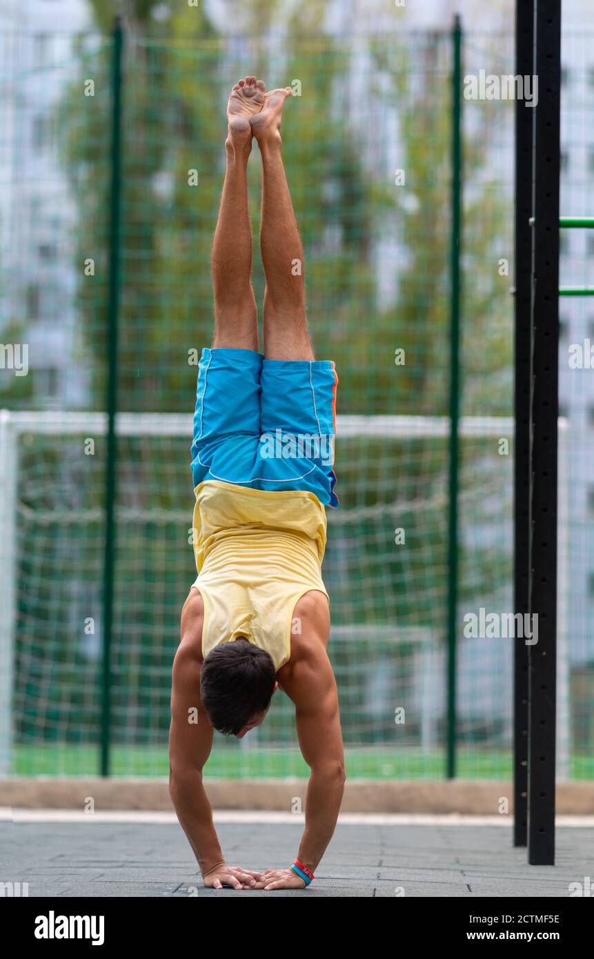 Man gymnast doing handstand hi-res stock photography and images - Alamy