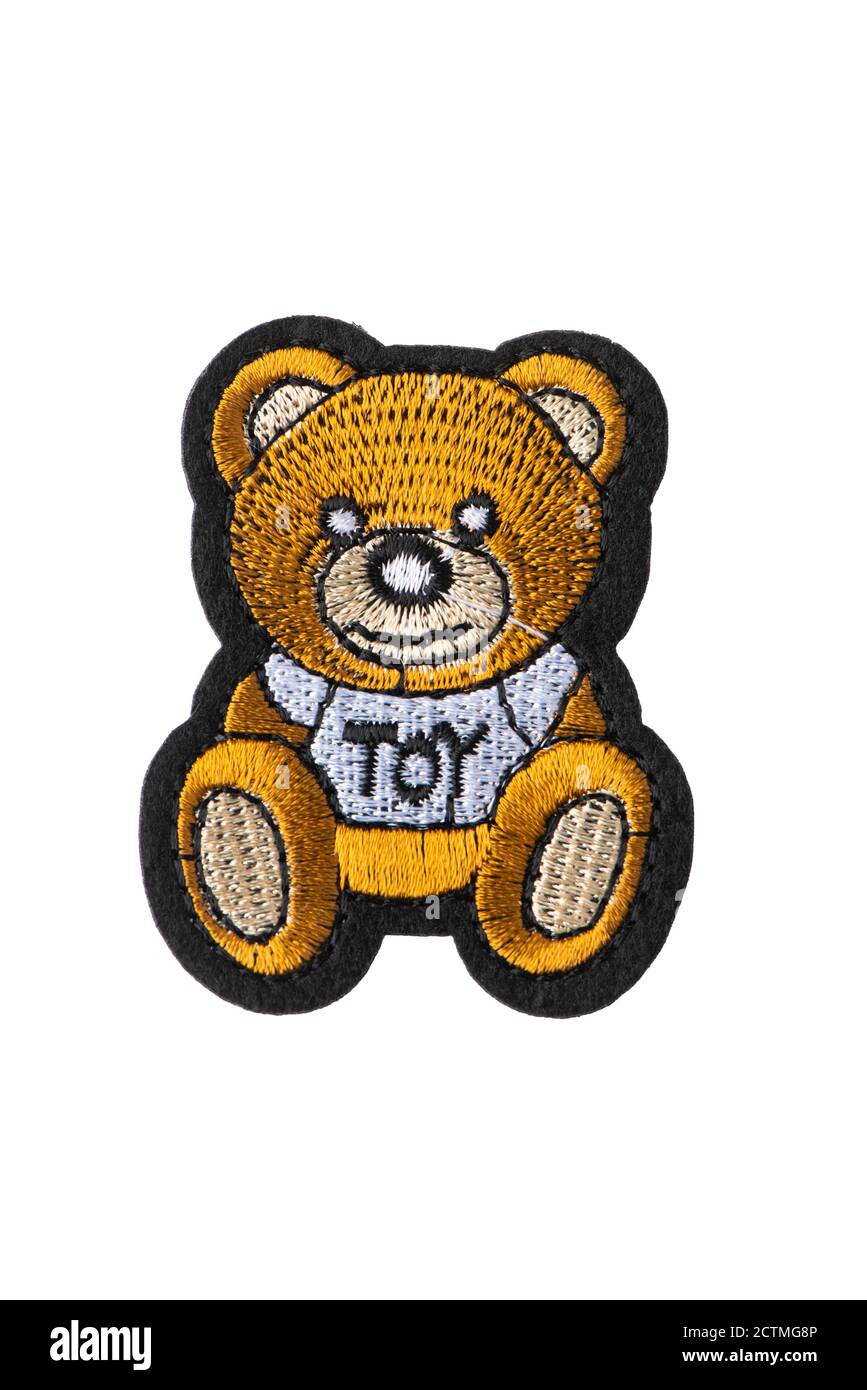Yellow Teddy bear embroidered patch isolated on white background Stock ...