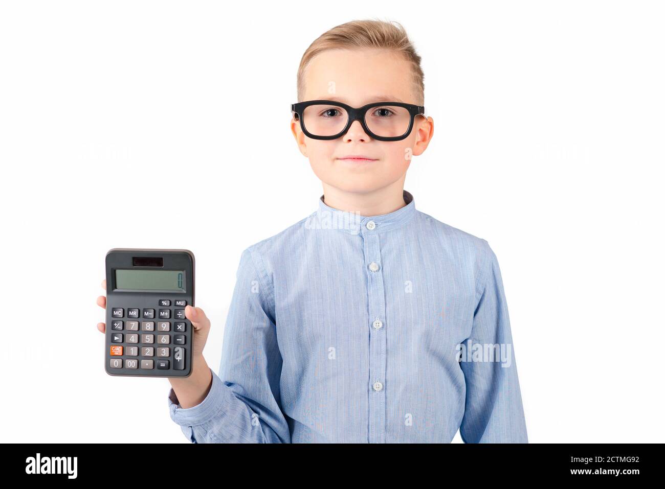 Portrait of funny cute teen boy touching his head with hand. child with ...