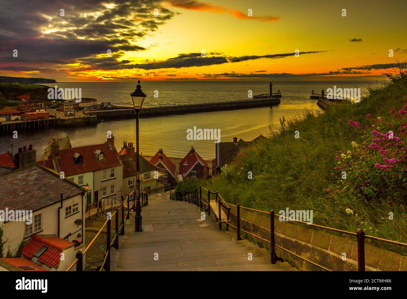199 steps leading from the abbey down to Whitby harbour. Warm colours ...