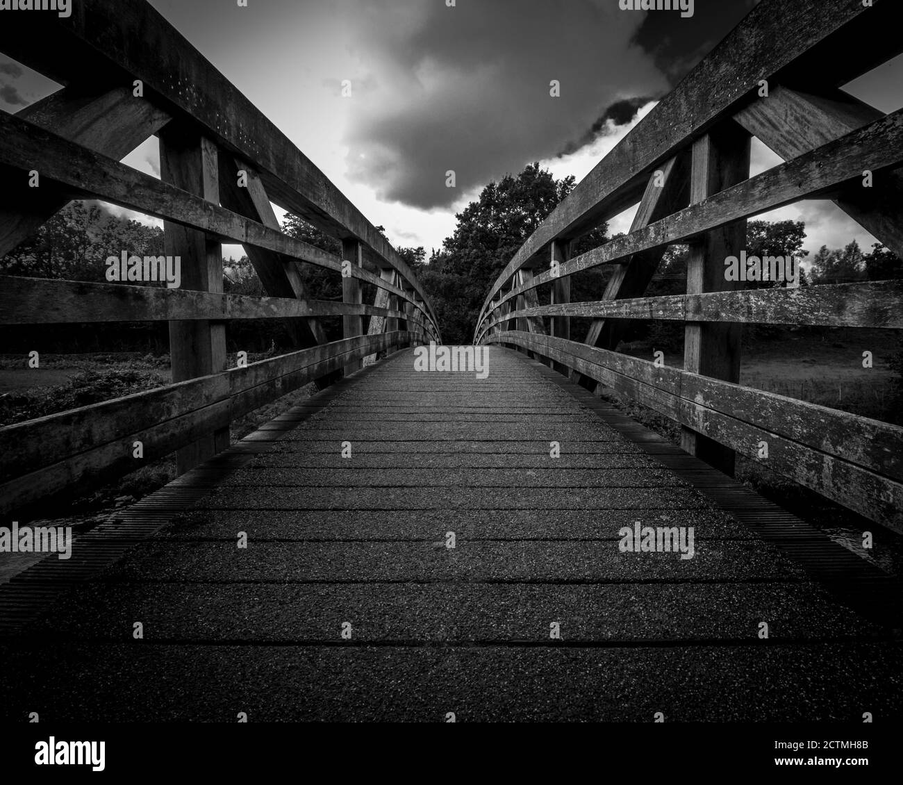 Wooden bridge footbridge countryside Black and White Stock Photos ...