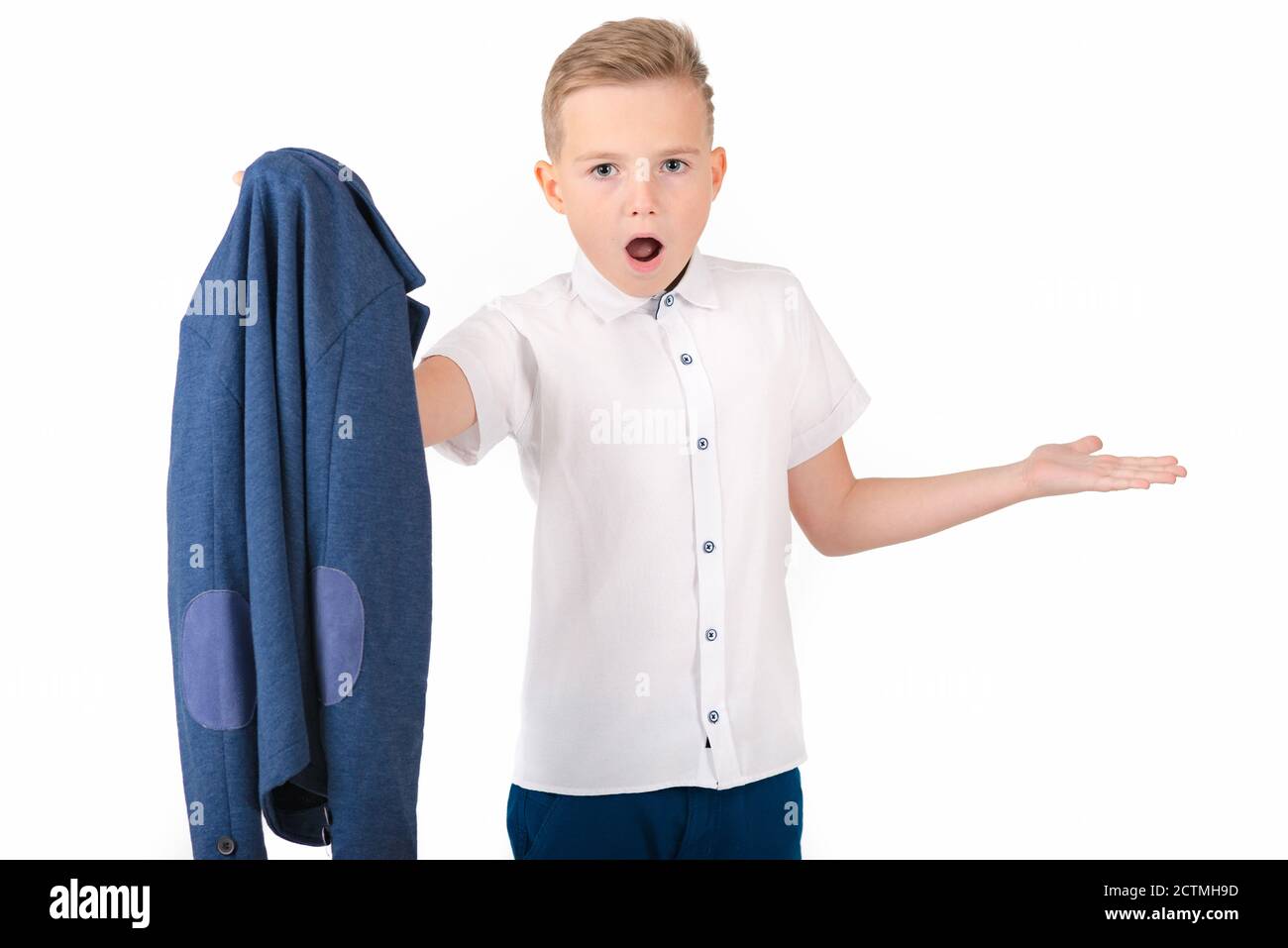 Front view portrait of disappointed student holds the school suit ...