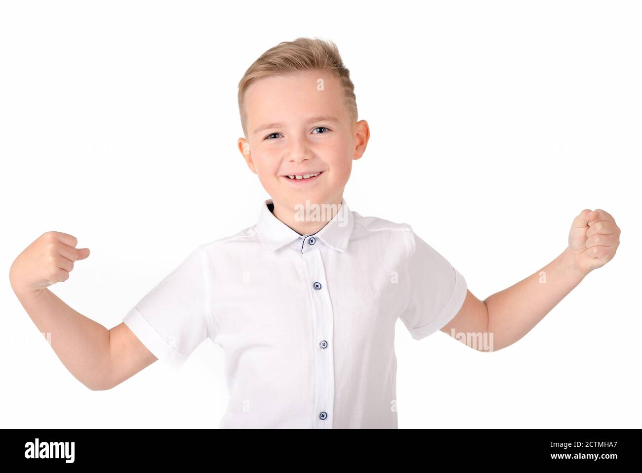 Close up image.The strong smiling caucasian school boy on a white ...