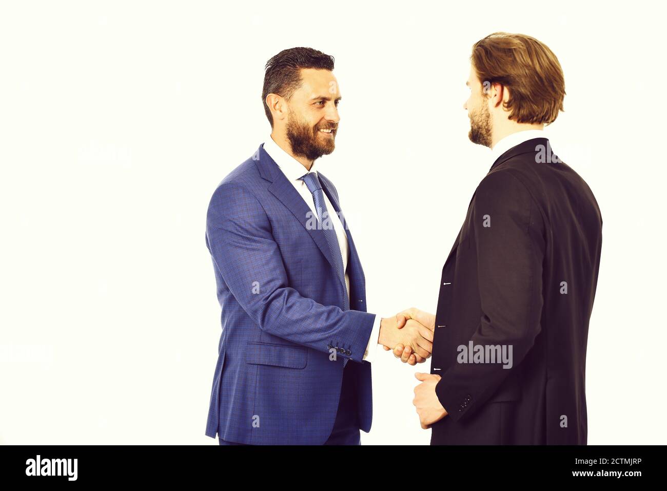 boss and employee, happy men in jacket hold hands each other in ...