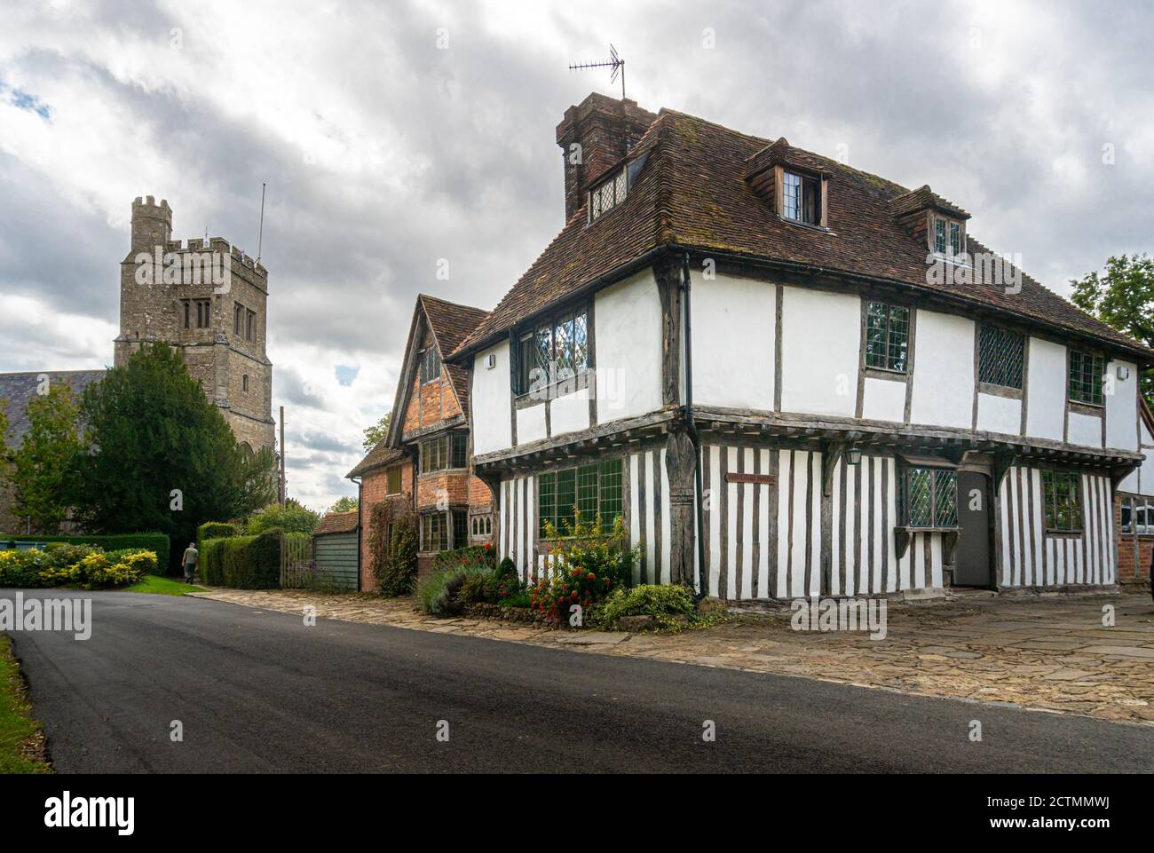 Smarden church and ancient timber-framed cottage in the village of ...