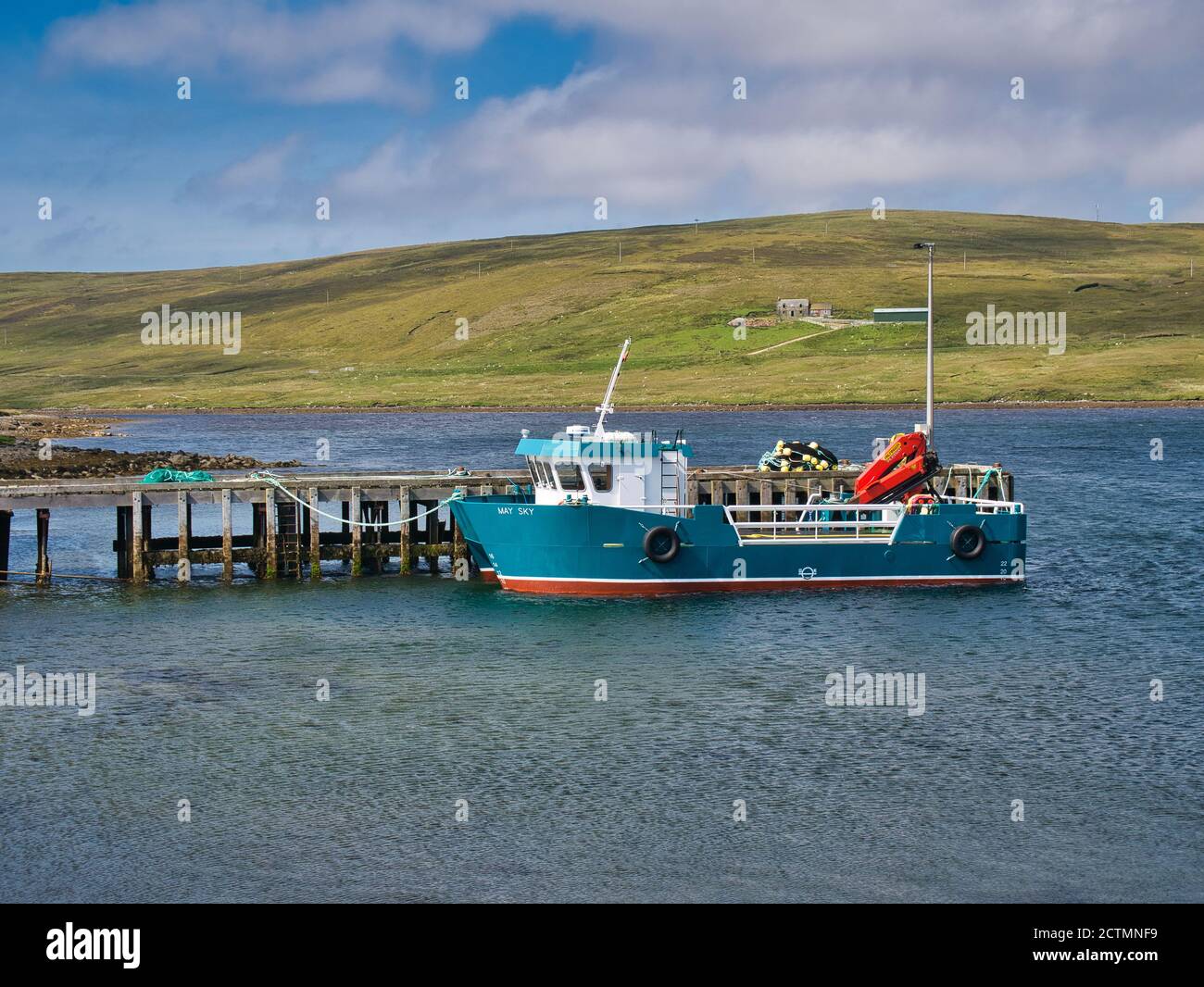 A Cooke Aquaculture support boat on Mid Yell Voe, Mid Yell on the ...
