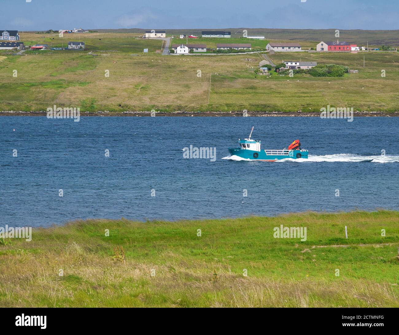 A Cooke Aquaculture support boat on Mid Yell Voe, Mid Yell on the ...