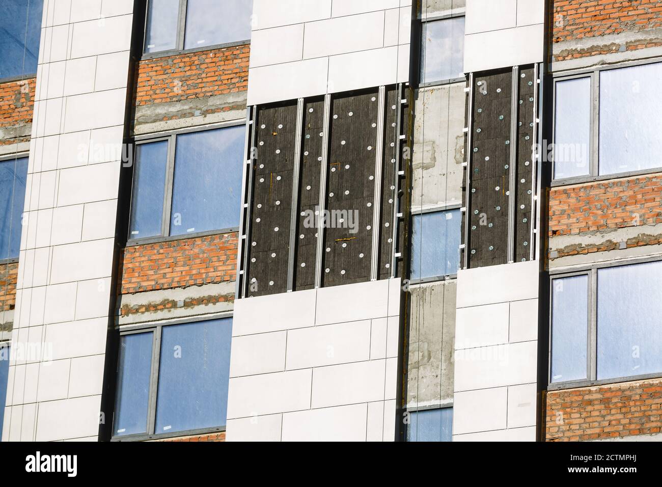 Thermal insulation of a house wall on a building site Stock Photo - Alamy