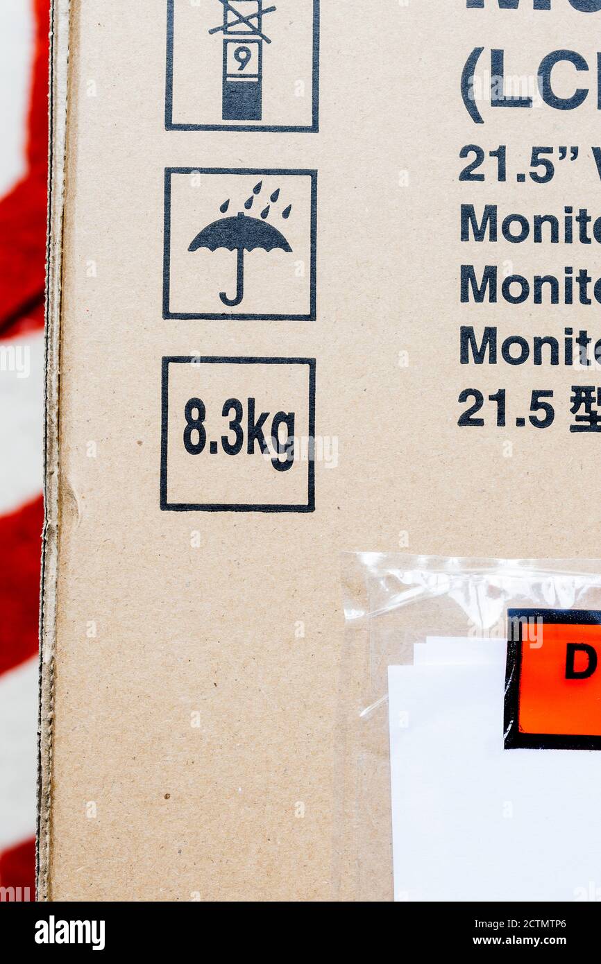 Handling instructions on cardboard box hi-res stock photography and ...