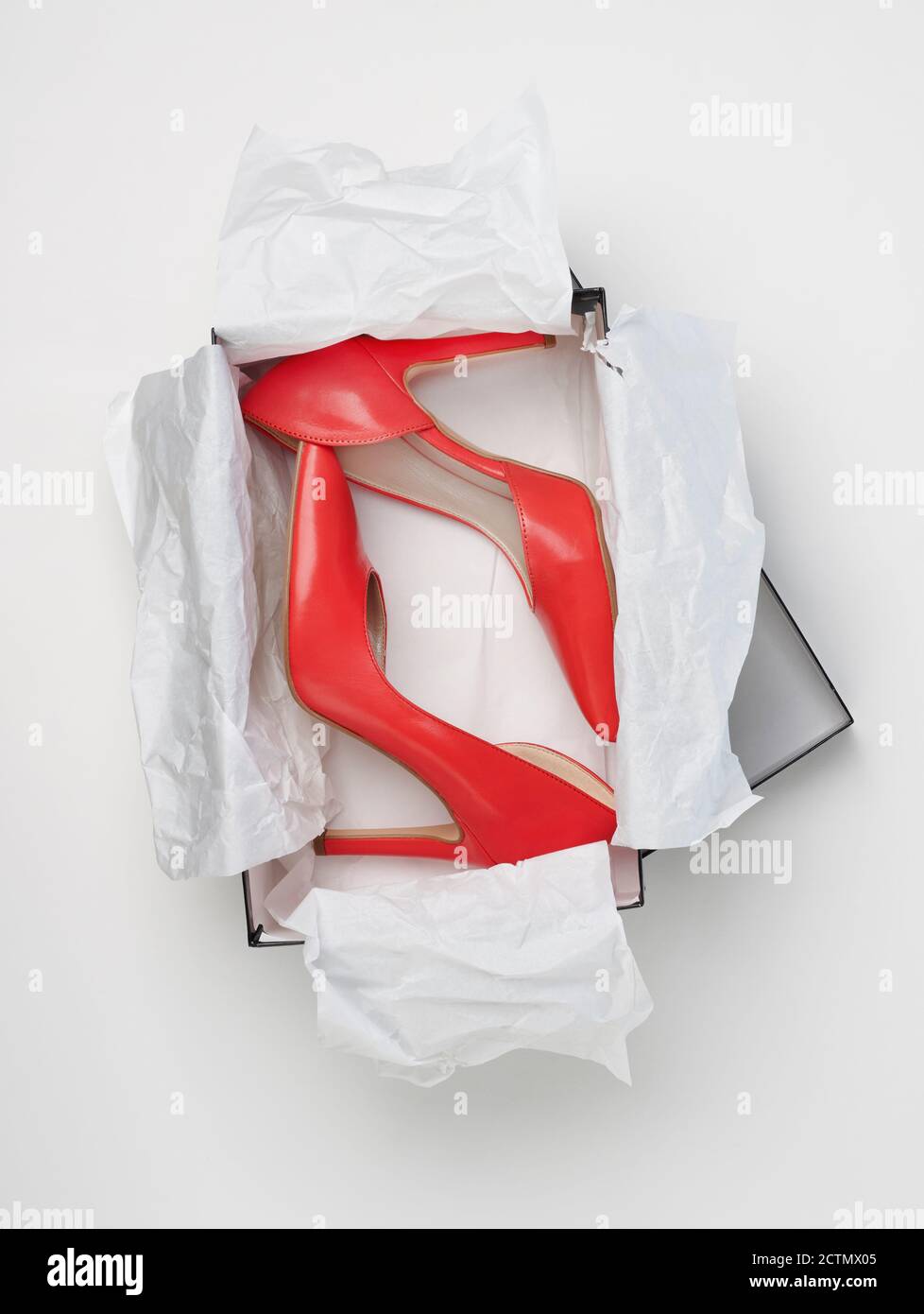 Red high heels in box Stock Photo - Alamy