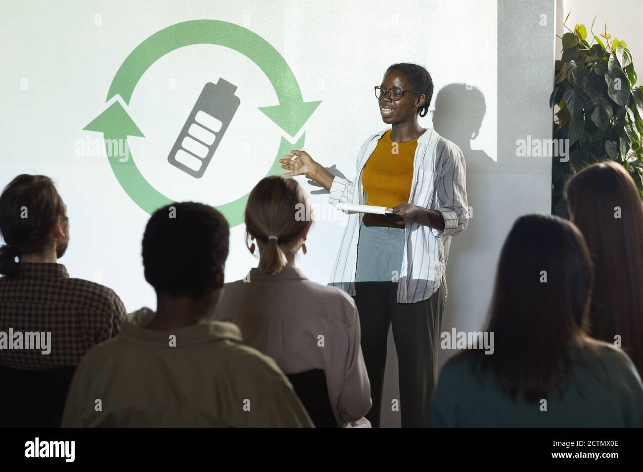 Woman Giving A Speech To A Crowd