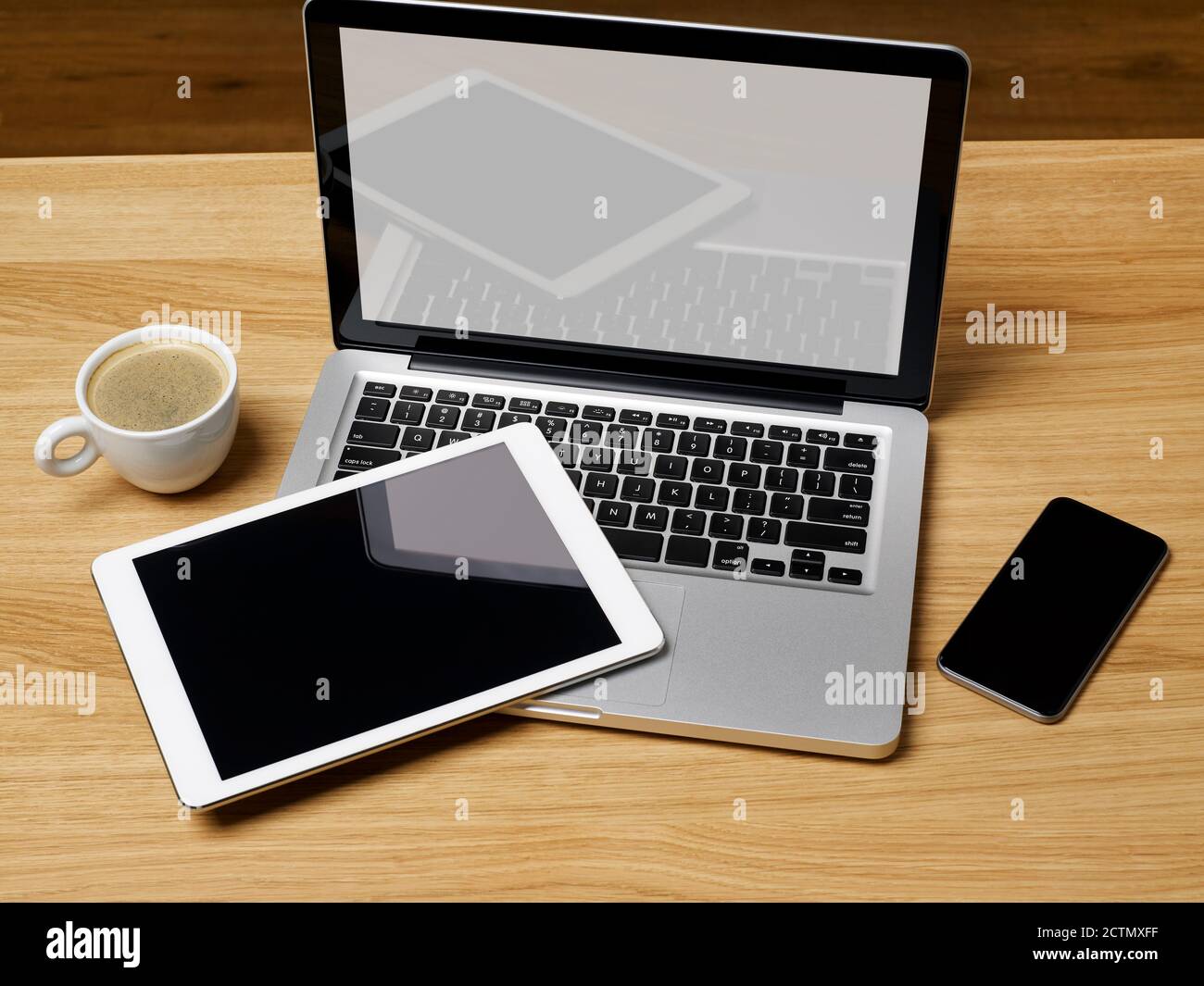 Digital generated devices on desktop hi-res stock photography and ...