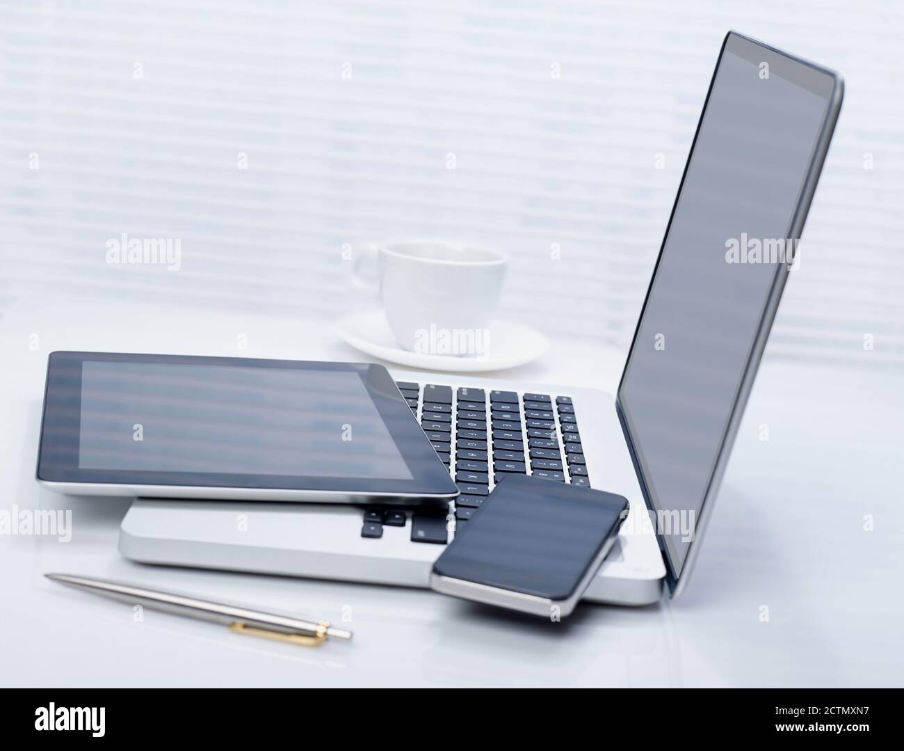 Office devices on desk Stock Photo - Alamy