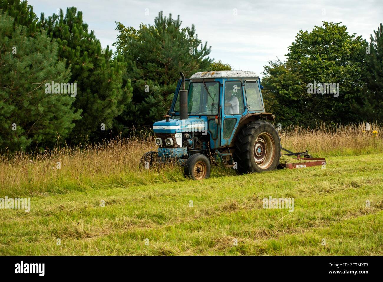 Ford tractor with grass topper hi-res stock photography and images - Alamy