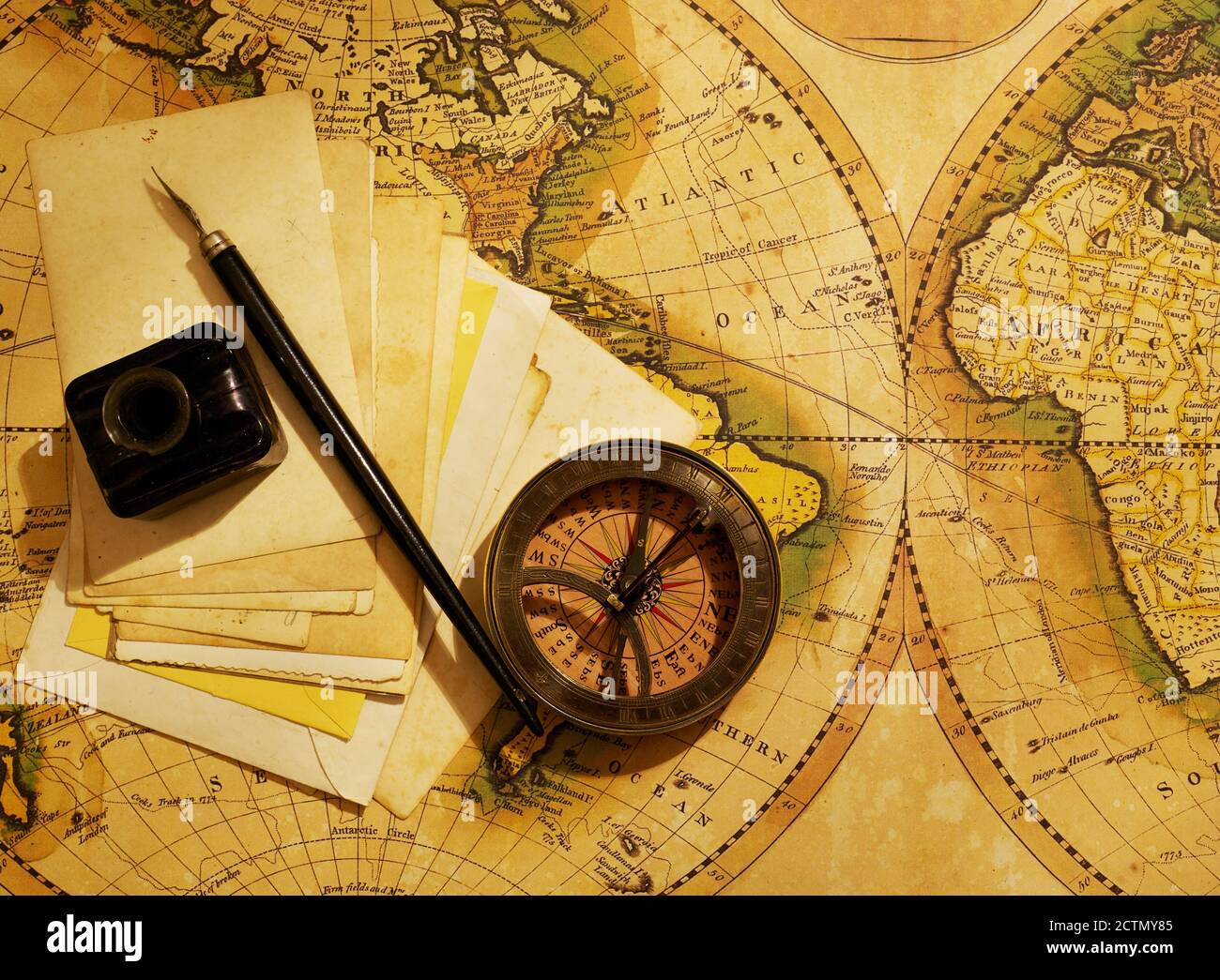 Compass and letters over old map from XVIII century Stock Photo - Alamy