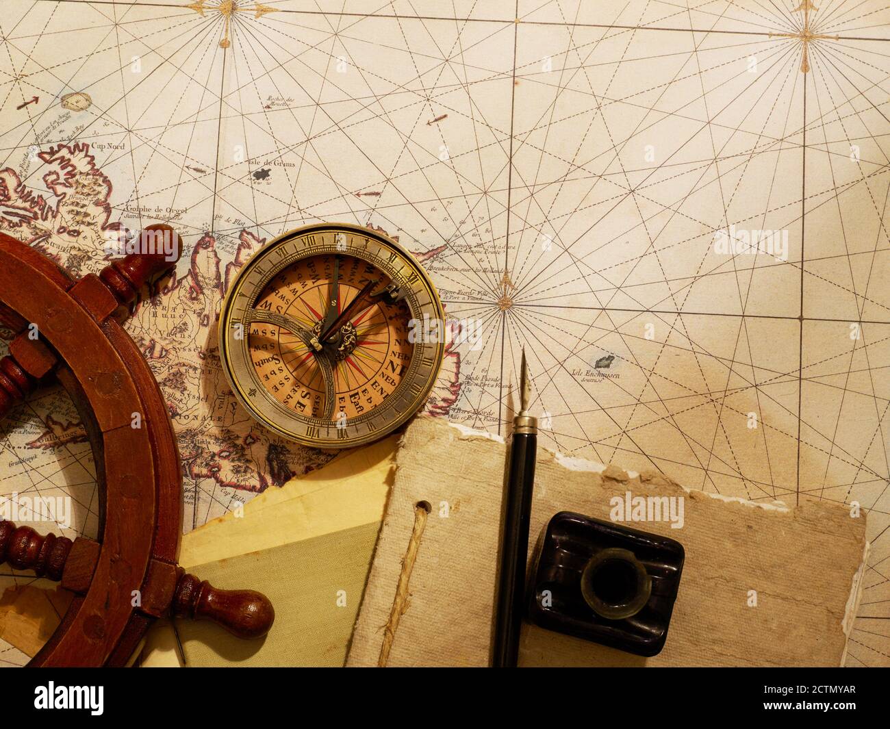 Marine equipment over old map from XVIII century Stock Photo - Alamy