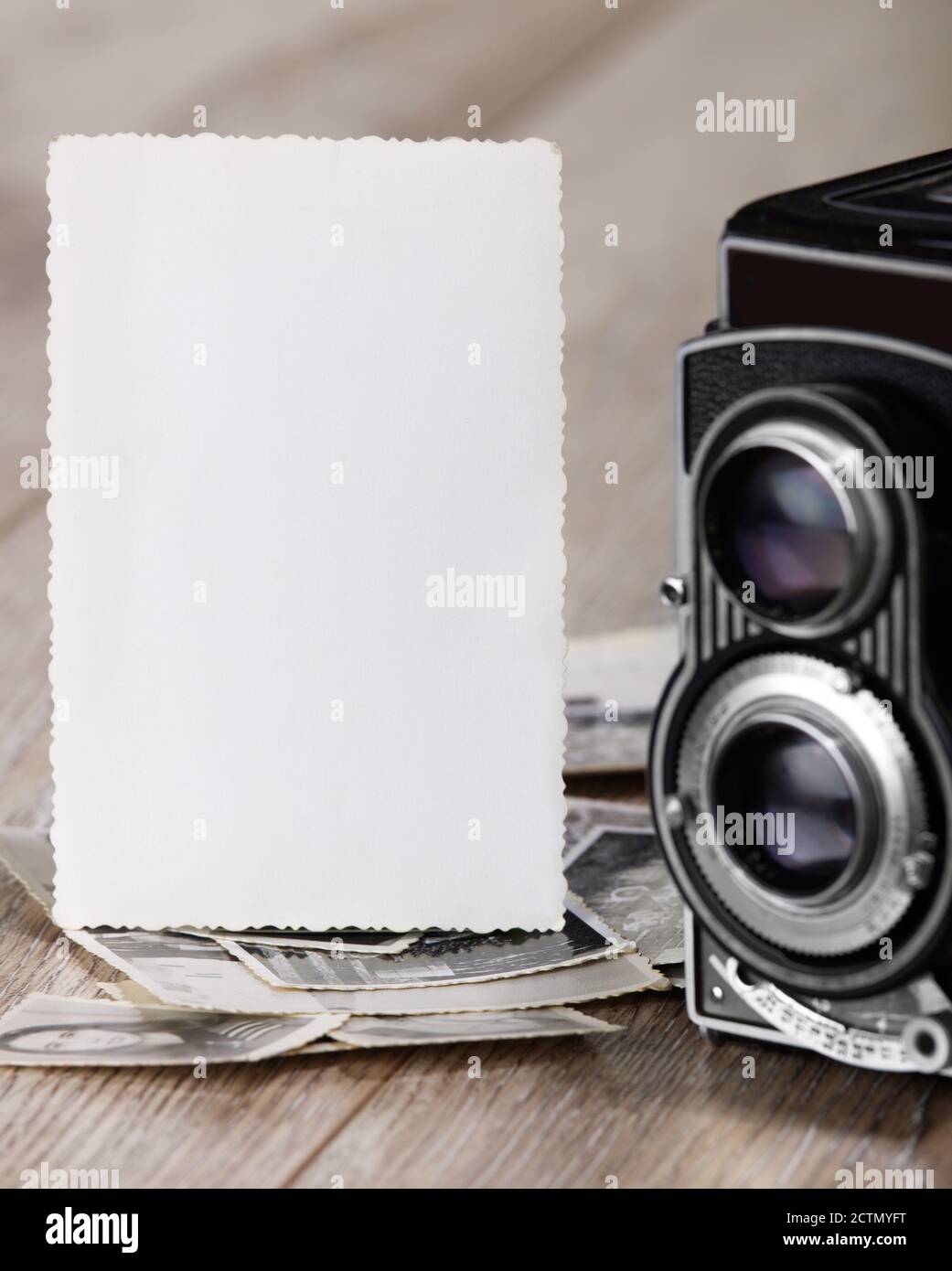 Old blank photo and camera Stock Photo - Alamy