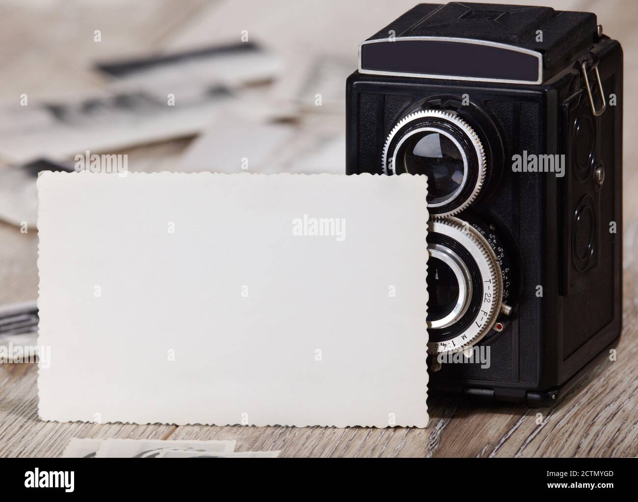 Old blank photo and camera Stock Photo - Alamy