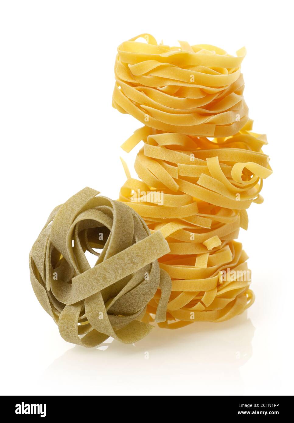 Pasta nests isolated on white Stock Photo - Alamy