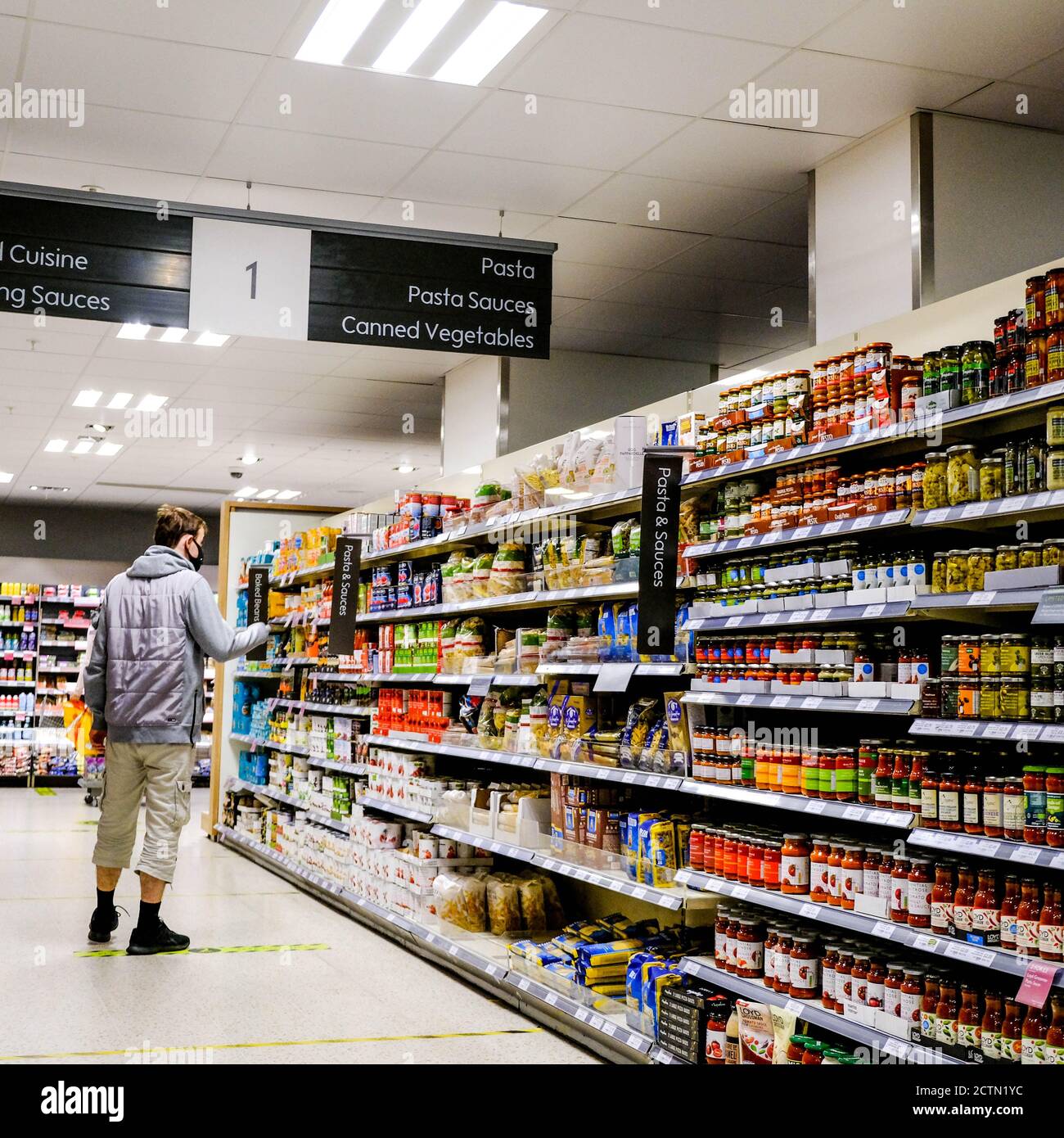 Stacked Shelves With A Selection Of Foods In John Lewis Waitrose, With ...