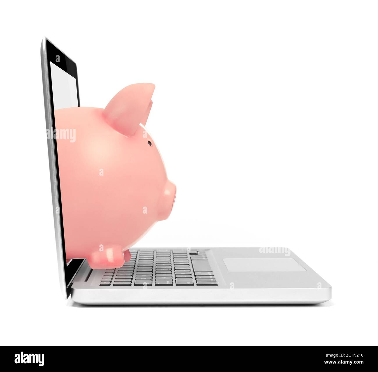 Piggy bank and laptop, white background Stock Photo - Alamy