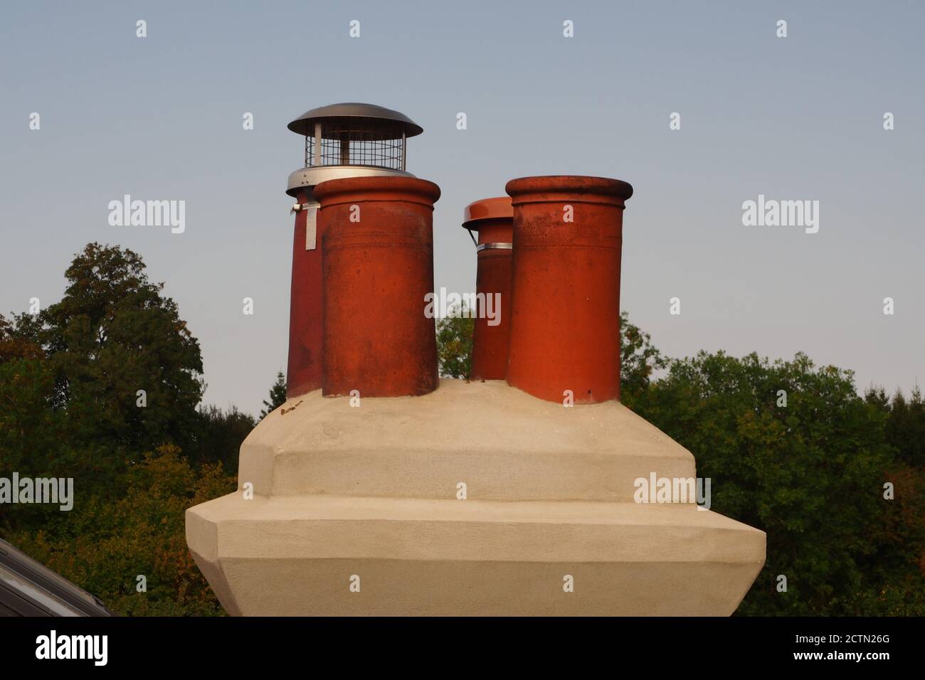 A close up view of a newly renovated house chimney stack, braced ...