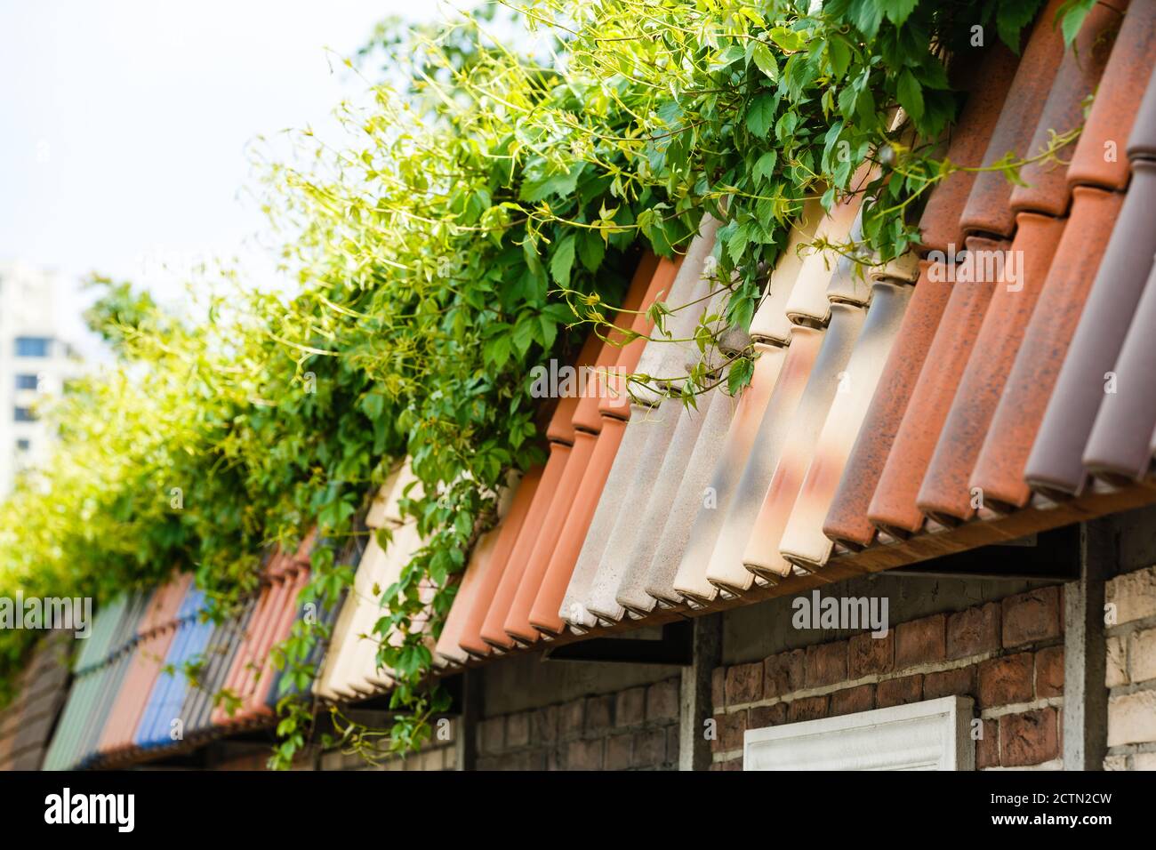red brick wall house roof details closeup Stock Photo - Alamy