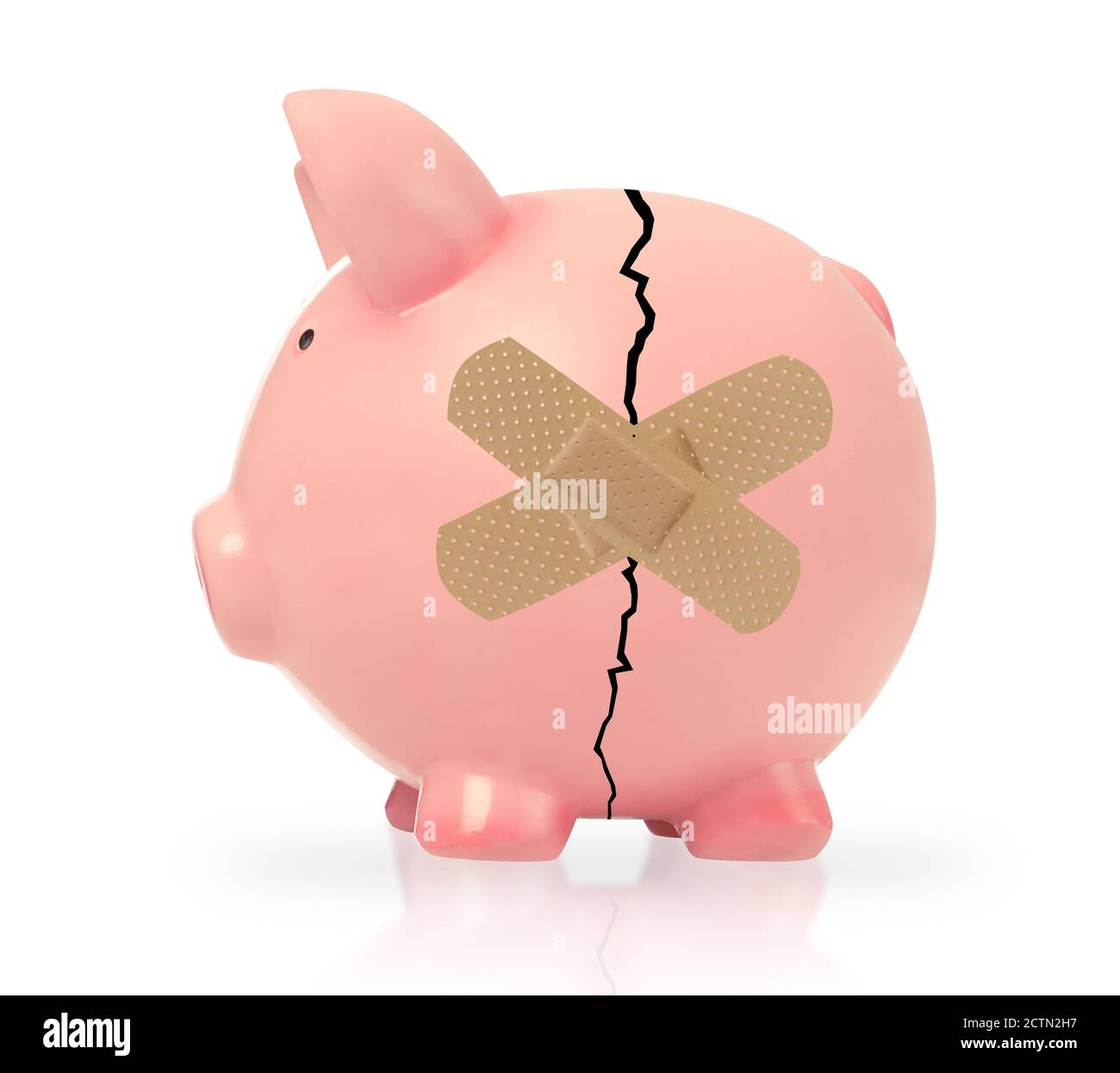 Broken piggy bank with band aid, white background Stock Photo - Alamy