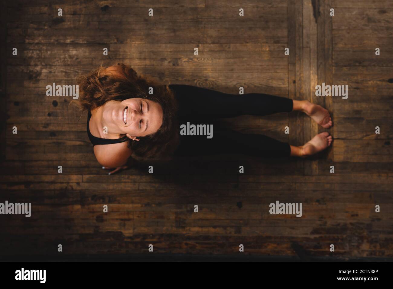 Top view of young smiling women do complex of stretching yoga asanas in ...