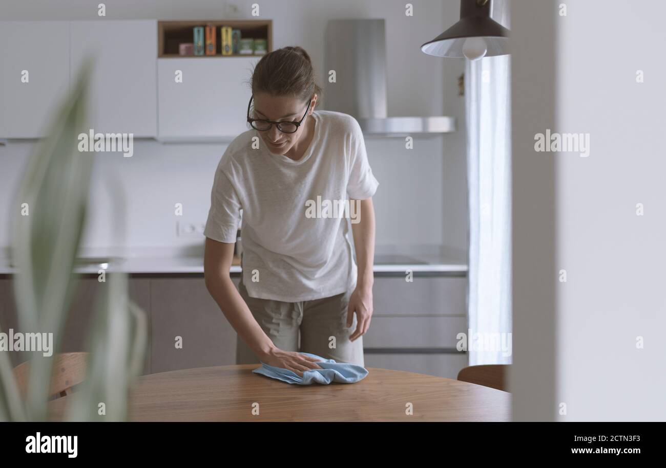 Woman doing housework hi-res stock photography and images - Alamy