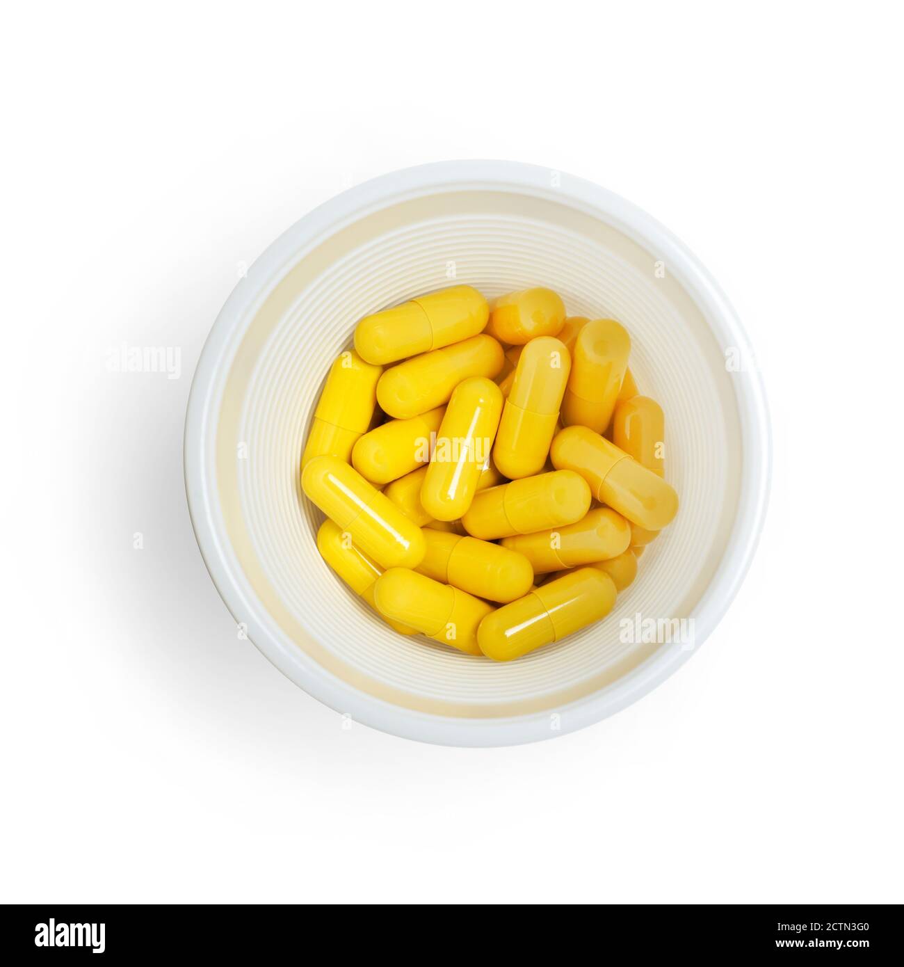 Pills in a plastic glass Stock Photo - Alamy
