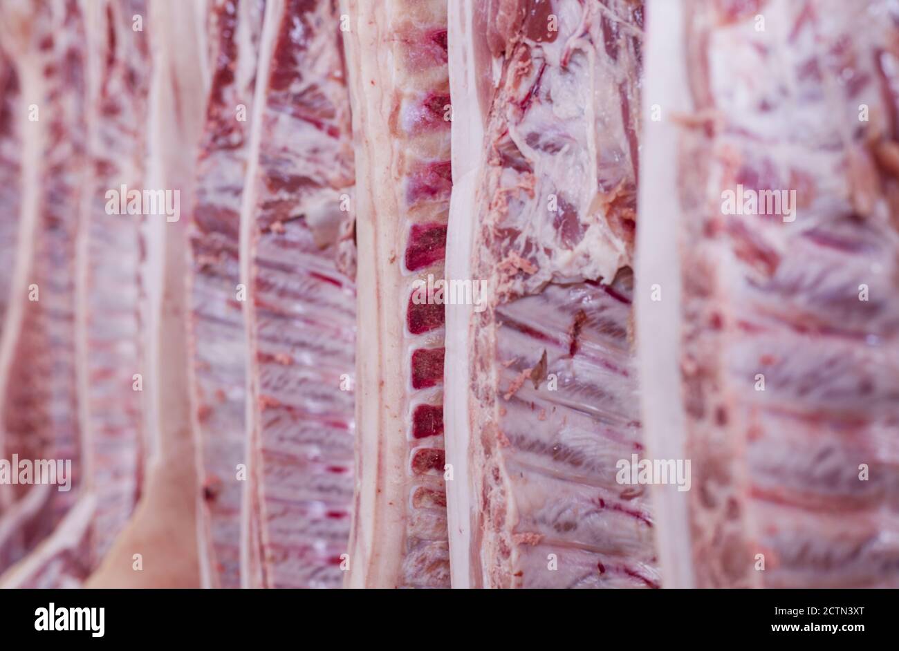 Meat in a row Stock Photo - Alamy