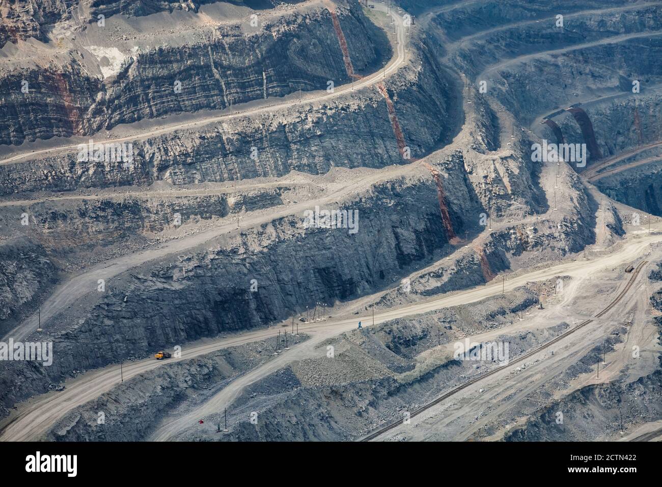 Open pit mining raw minerals for steel production. Giant iron ore ...