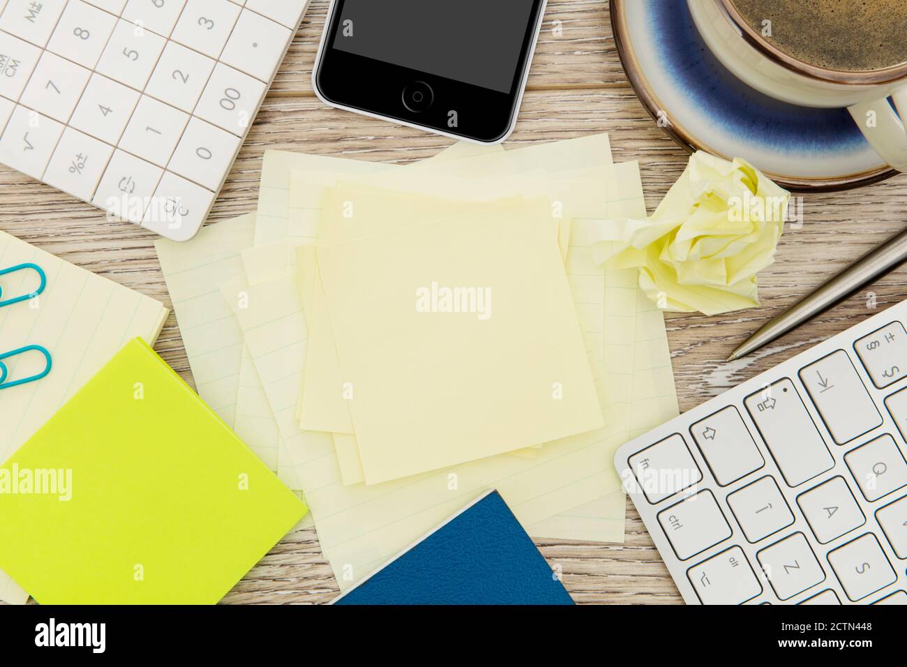 Blank adhesive note on office table Stock Photo - Alamy