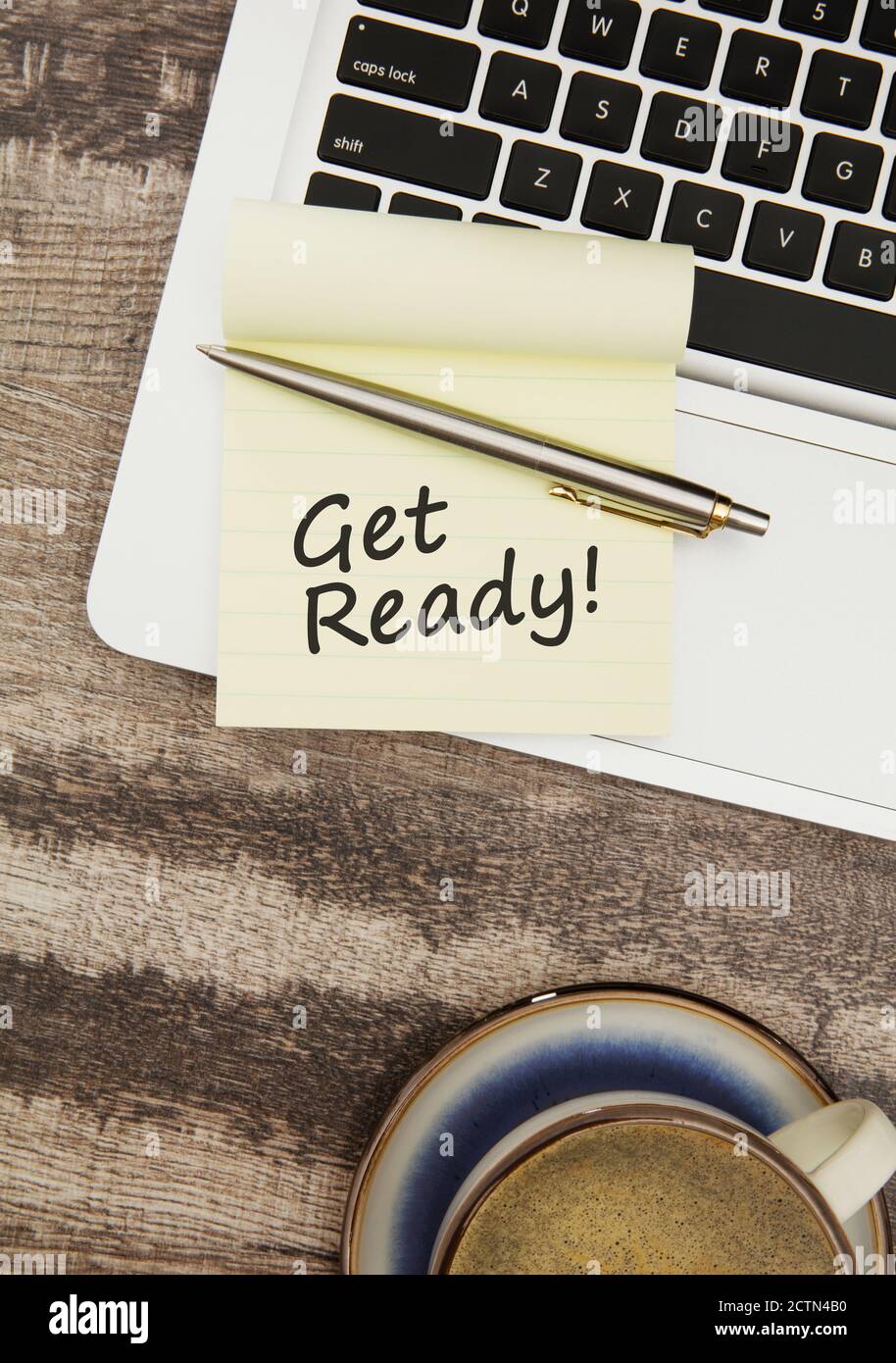 Get ready message on adhesive note on office table Stock Photo - Alamy