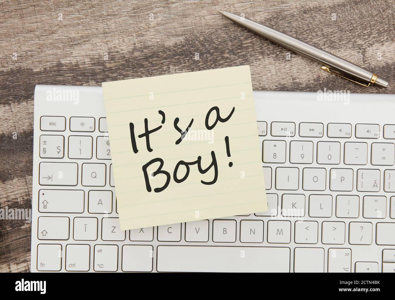 It's a boy message on adhesive note Stock Photo - Alamy