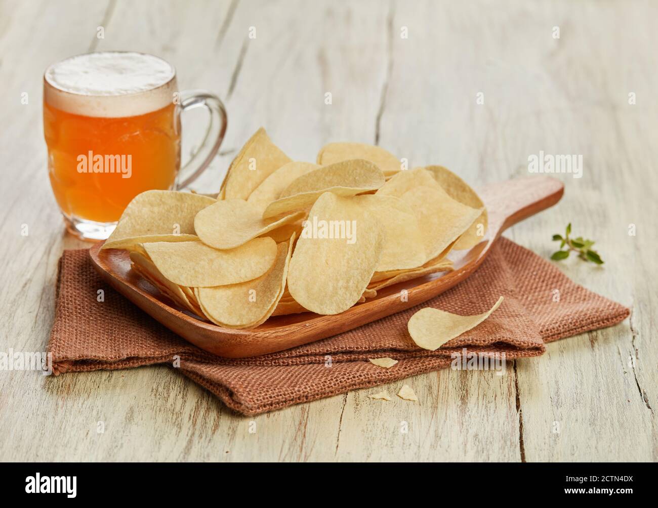Potato chips and beer Stock Photo - Alamy