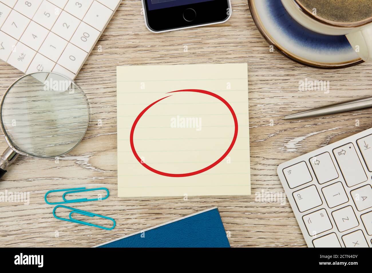 Adhesive note on desk Stock Photo - Alamy