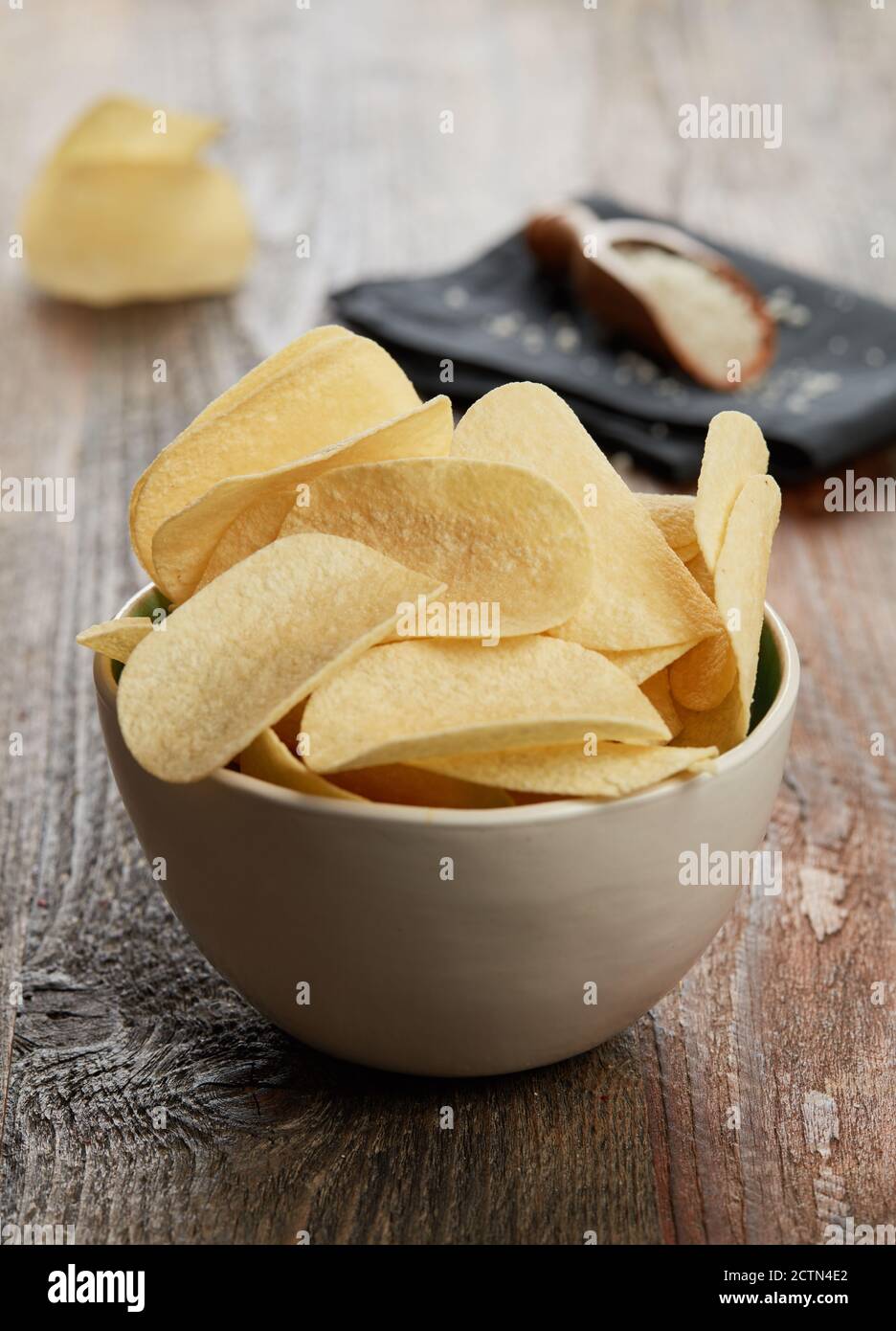 Potato chips on table Stock Photo - Alamy