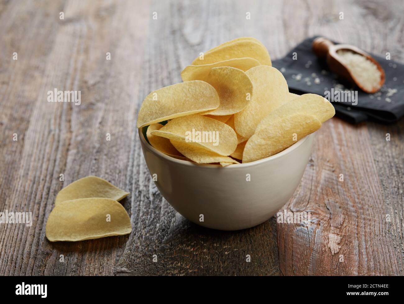 Potato chips on table Stock Photo - Alamy