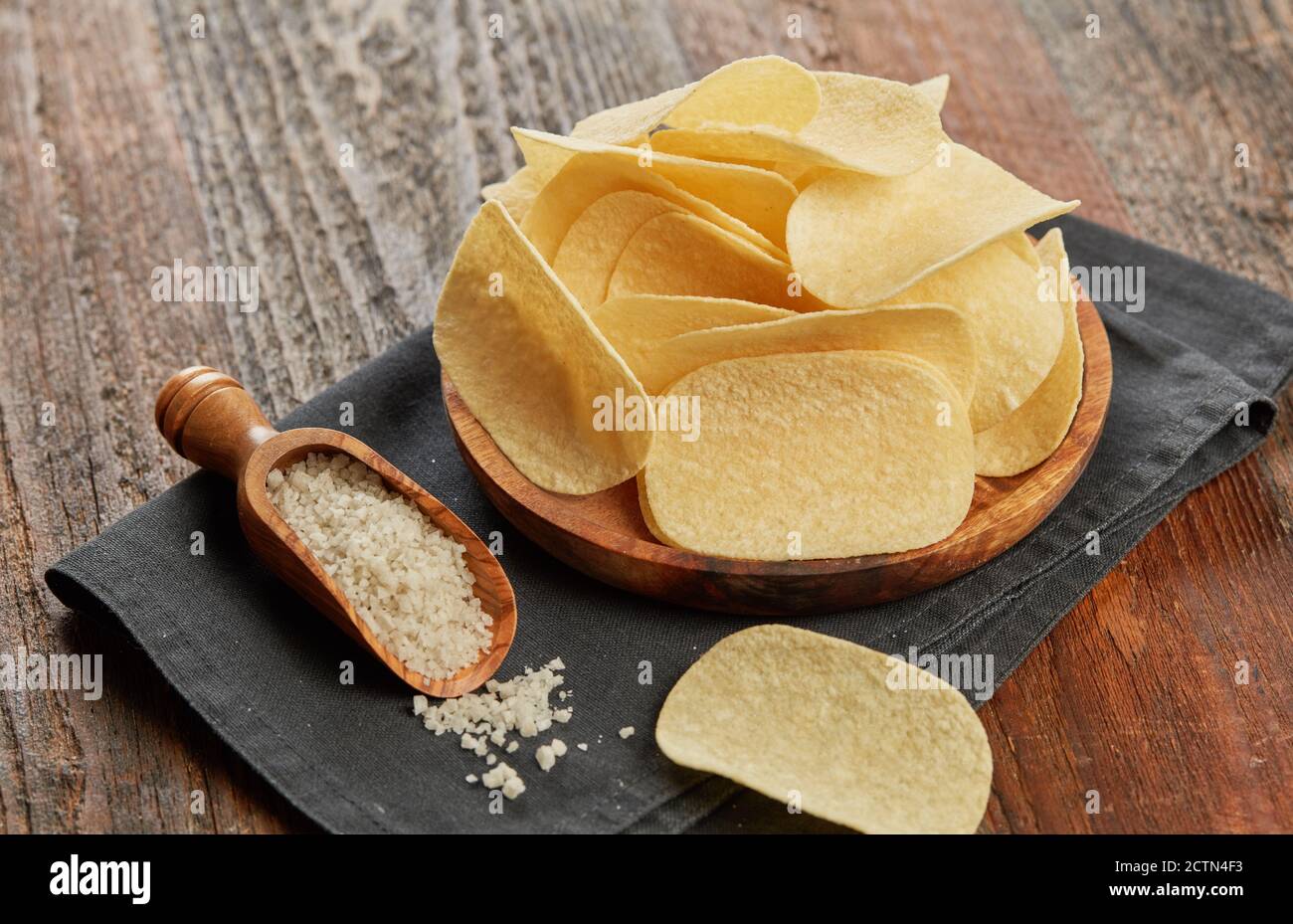 Potato chips on table Stock Photo - Alamy