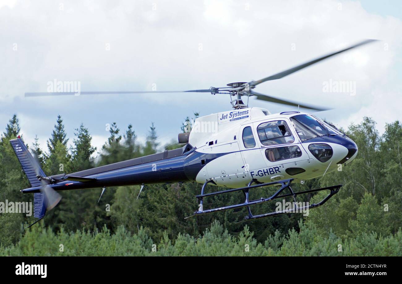 A flight in an Aerospatiale AS350 B3 Ecureuil helicopter, from the ...