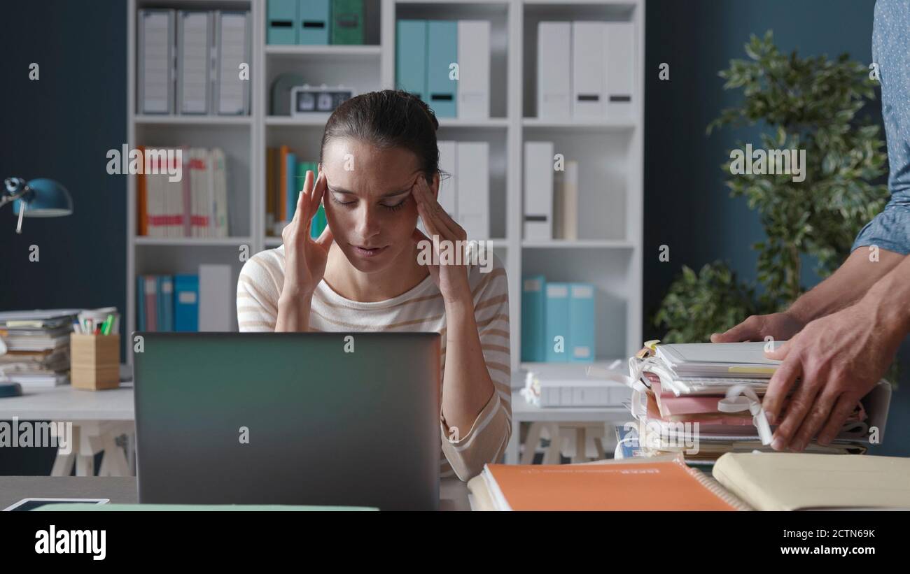 Young stressed secretary in hi-res stock photography and images - Alamy