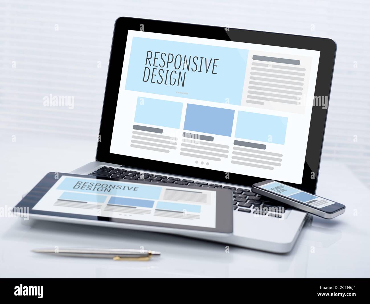 Responsive design on devices on desk Stock Photo - Alamy