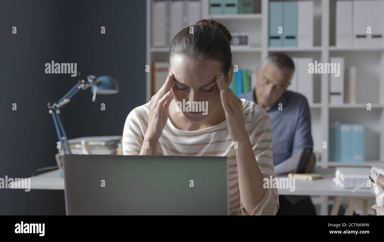 Young stressed secretary in hi-res stock photography and images - Alamy